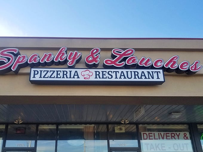 Same exterior, different angle—still promising the Italian-American dream in glowing red letters that say "get in here, you're hungry."