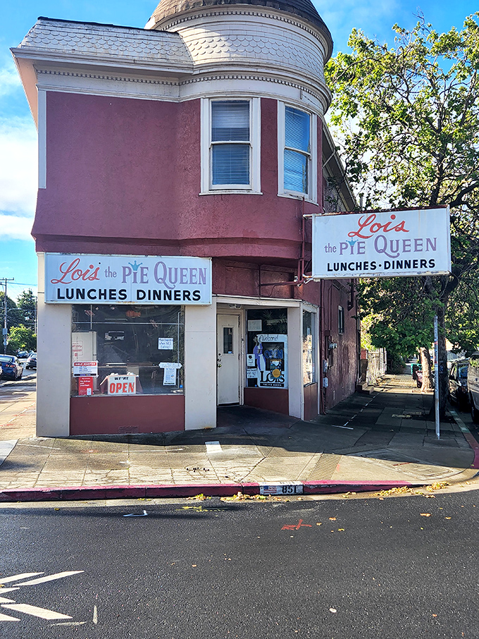 The pink corner building that houses Lois the Pie Queen stands like a beacon of comfort food in Oakland, promising Southern delights within its unassuming walls.