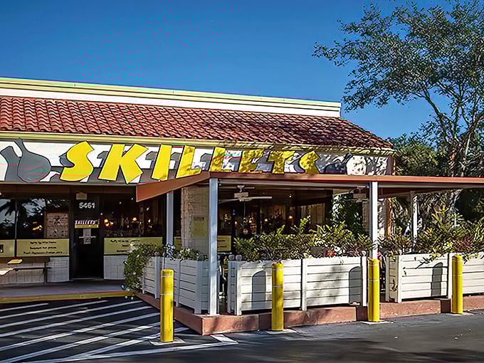 The cheerful yellow Skillets sign welcomes hungry patrons like a breakfast beacon on Airport-Pulling Road. Florida sunshine and comfort food – what more could you want?
