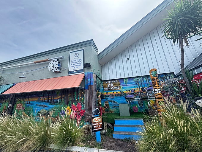 The exterior promises exactly what it delivers – no-nonsense seafood in a building that looks like a beach party decided to stay forever.