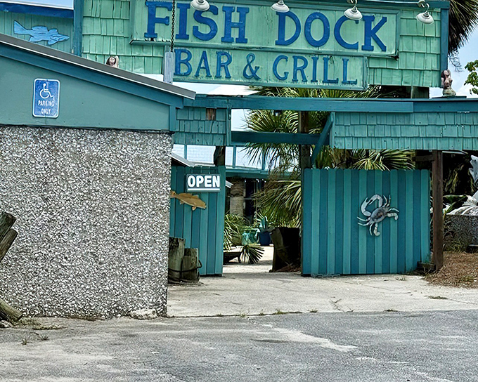 The turquoise-hued exterior of The Fish Dock is like a siren call to seafood lovers, complete with decorative crab that practically winks at hungry visitors.
