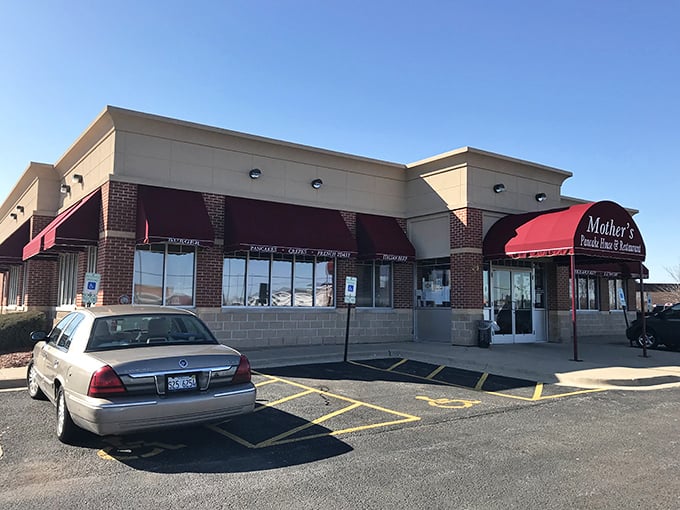 Those iconic red awnings aren't just for show—they're beacons calling hungry breakfast enthusiasts to Aurora's temple of morning delights.