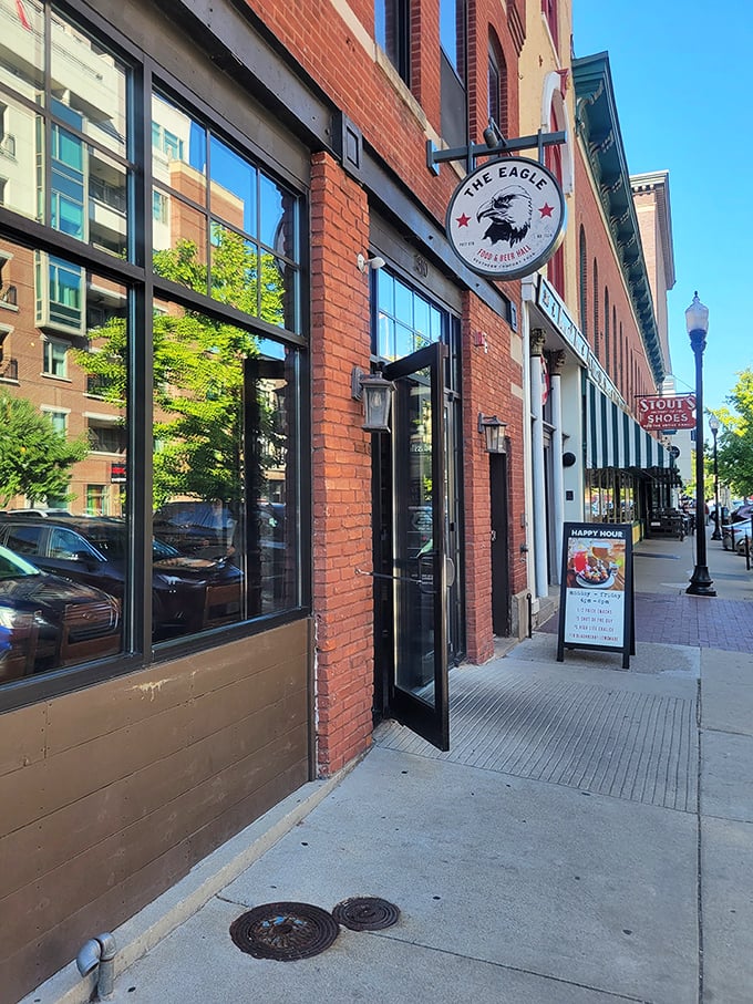 A sunny day on Mass Ave highlights The Eagle's classic signage—proof that good taste extends beyond just what's on your plate.