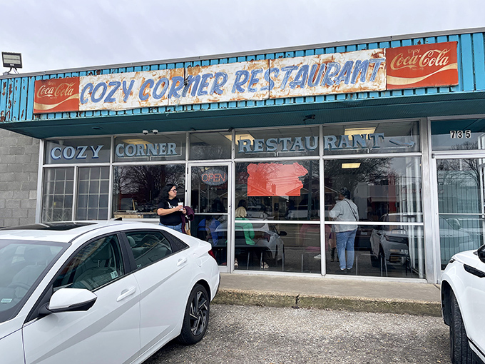 The blue-trimmed façade of Cozy Corner stands like a barbecue beacon in Memphis, promising smoky treasures within. No fancy frills needed when the food speaks this loudly.