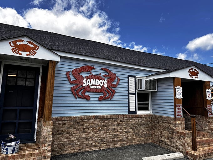 The blue exterior with those giant red crab signs isn't just decoration—it's nature's way of saying "seafood paradise ahead!"