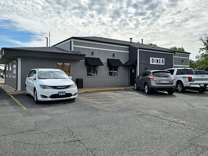 The unassuming exterior of Bartonville Diner stands like a culinary lighthouse in central Illinois, promising comfort food treasures within its modest gray walls.