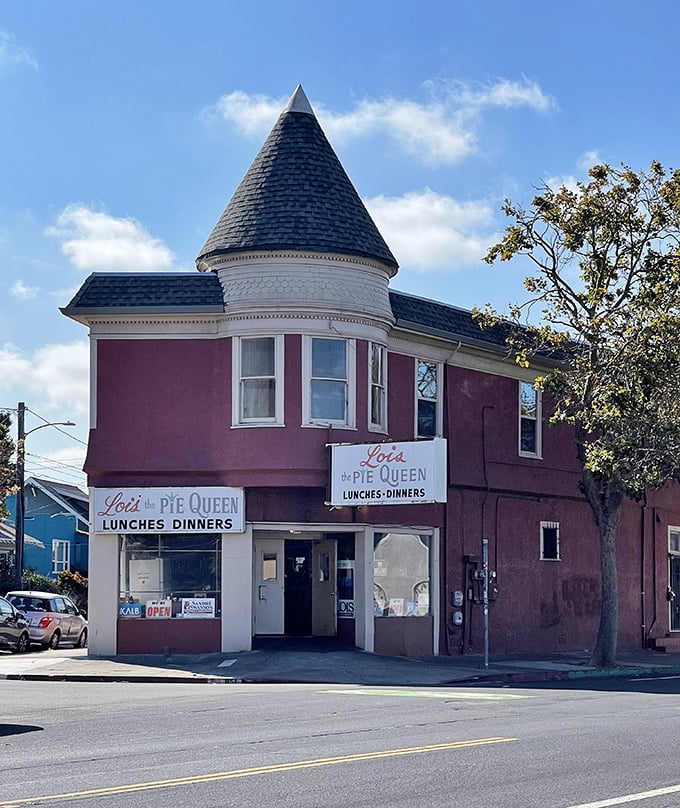 That turret isn't just architectural flair – it's a crown for Oakland royalty, where Southern comfort reigns supreme in burgundy splendor.