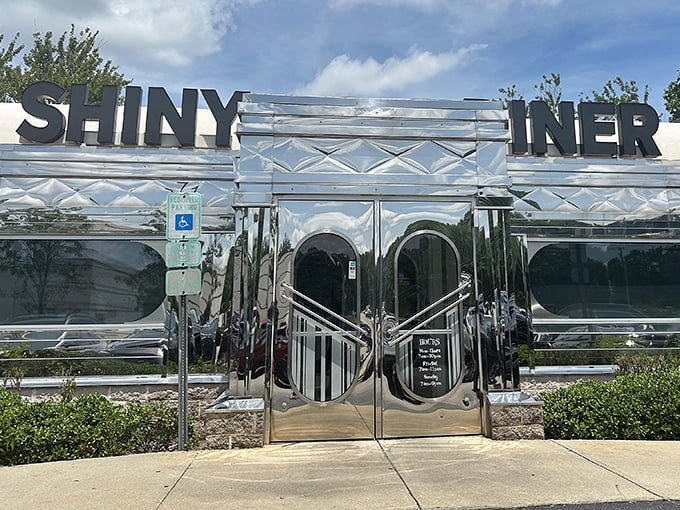 The gleaming exterior of The Shiny Diner lives up to its name, reflecting both sunlight and the golden age of American dining.