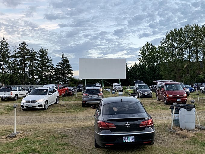 The classic view that makes movie lovers' hearts skip a beat—vehicles nestled together under an Oregon sky, waiting for dusk's cinematic magic.