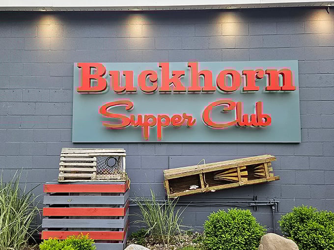 The iconic red signage of Buckhorn Supper Club stands out against the gray exterior, with lobster traps hinting at the treasures waiting inside.