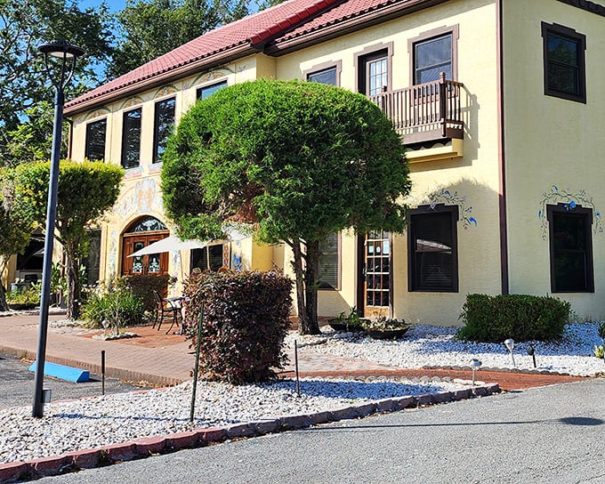 The Mediterranean-meets-Bavaria façade of Yalaha Bakery stands like a delicious mirage in Central Florida, promising authentic German treats behind those ornate doors.