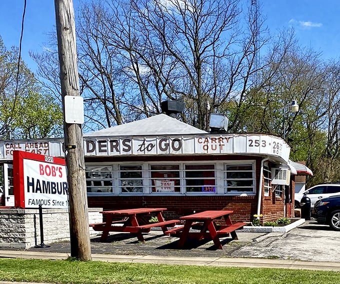 The little white building with "BOB'S HAMBURG" blazoned across the sign isn't trying to impress anyone—except your taste buds.