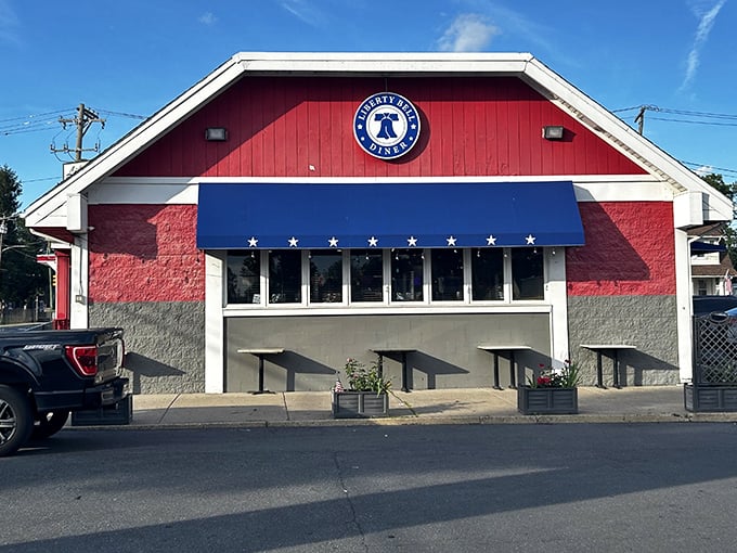 The Liberty Bell Diner's patriotic exterior stands as proudly as its namesake, promising American comfort food with Philadelphia flair.