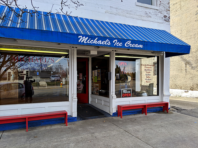 That iconic blue awning and those cherry-red benches aren't just street decor—they're a beacon of sweet salvation on Jackson's Main Street.