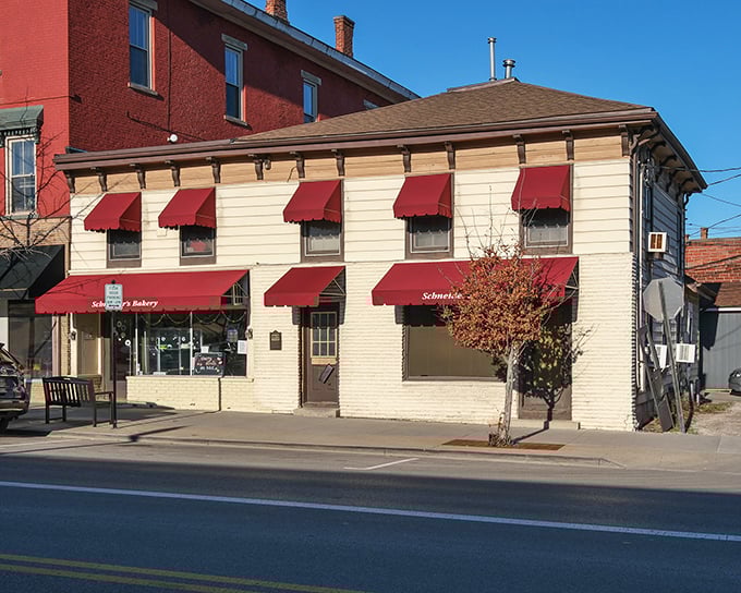 The iconic cream-colored facade with cherry-red awnings stands like a sweet sentinel on Westerville's College Avenue, beckoning carb enthusiasts since before Instagram made food photos a thing.
