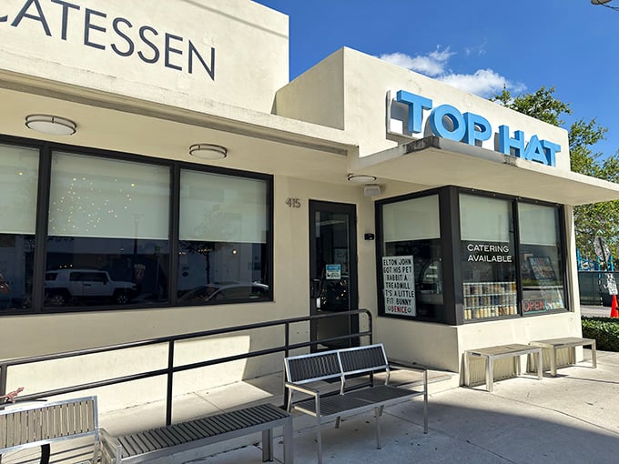 The bright blue "TOP HAT" sign beckons like a beacon of deli salvation on Fort Lauderdale's Federal Highway. Your stomach is already thanking you.
