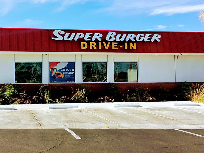 The iconic red and white facade of Super Burger Drive-In stands like a time capsule of Americana in Porterville, beckoning hungry travelers with its no-nonsense promise of satisfaction.