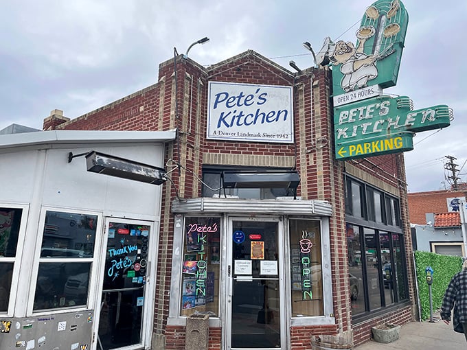 That iconic neon sign beckons like a lighthouse for the hungry—Pete's Kitchen has been Denver's 24-hour beacon of breakfast hope on Colfax Avenue for decades.