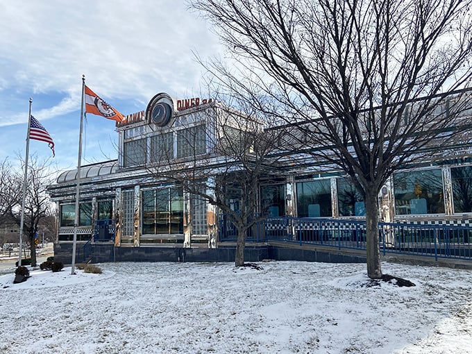 Shiny chrome, bold neon, and a dash of snow—this diner feels like a jukebox come to life.