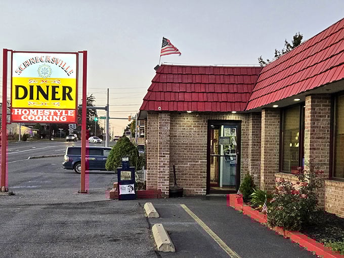 The iconic red roof and American flag announce your arrival at comfort food paradise. No passport required, just an appetite and stretchy pants.