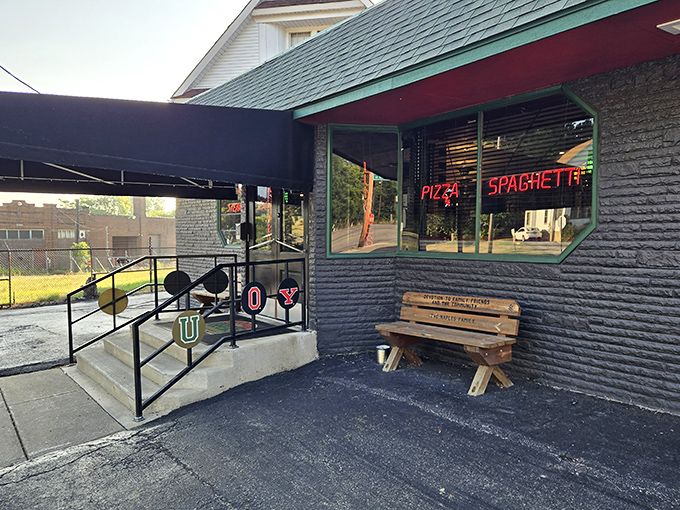 The neon promise of "PIZZA SPAGHETTI" glows like a beacon for hungry souls. This unassuming exterior hides culinary treasures that Youngstown locals have treasured for generations.