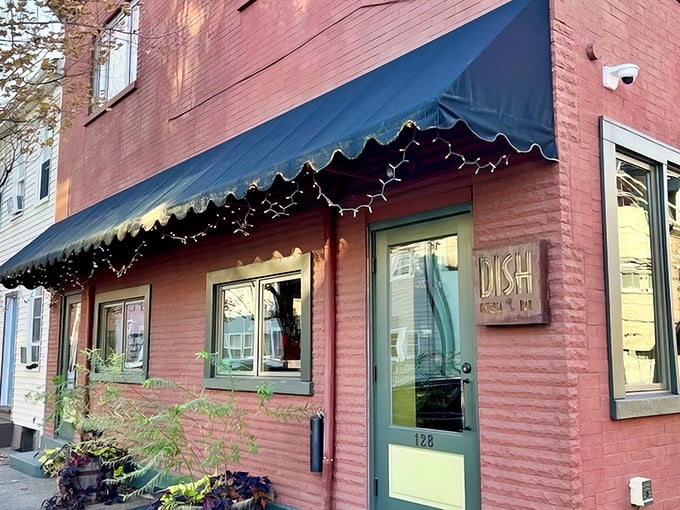 That navy blue awning signals you've arrived at the South Side's best-kept secret—a slice of Southern Italy in Steel City.