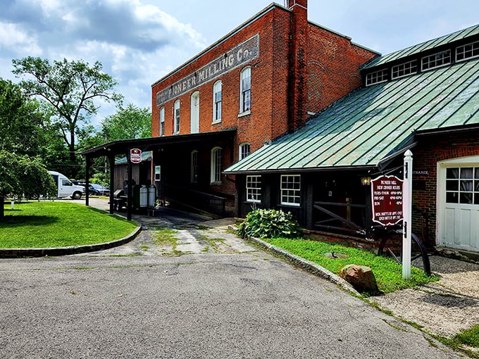The historic brick facade of Pioneer Mill stands proudly in Tiffin, where time-honored traditions meet modern culinary excellence.