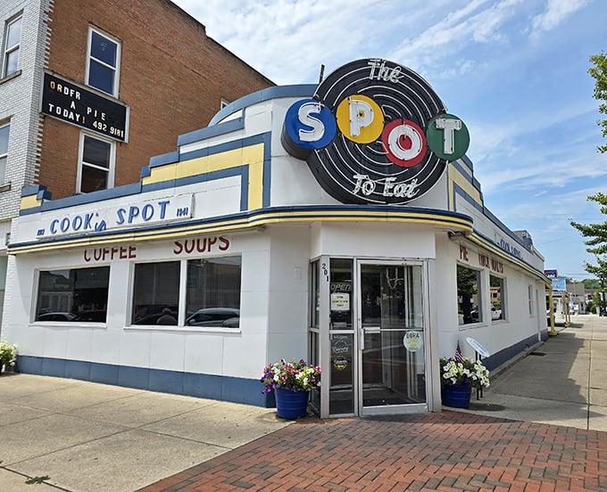 The architectural time machine that is The Spot Restaurant, with its iconic neon sign promising comfort food salvation to all who enter.