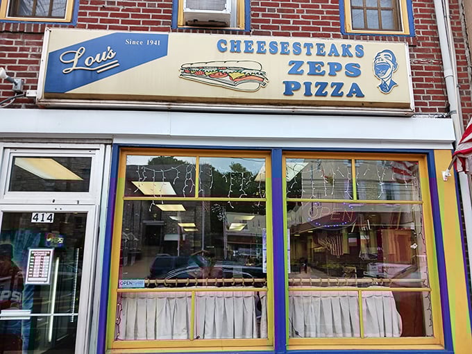 Lou's iconic blue and yellow storefront has been beckoning sandwich lovers to Norristown since 1941. Cheesesteaks, Zeps, and Pizza—the holy trinity of Pennsylvania comfort food.
