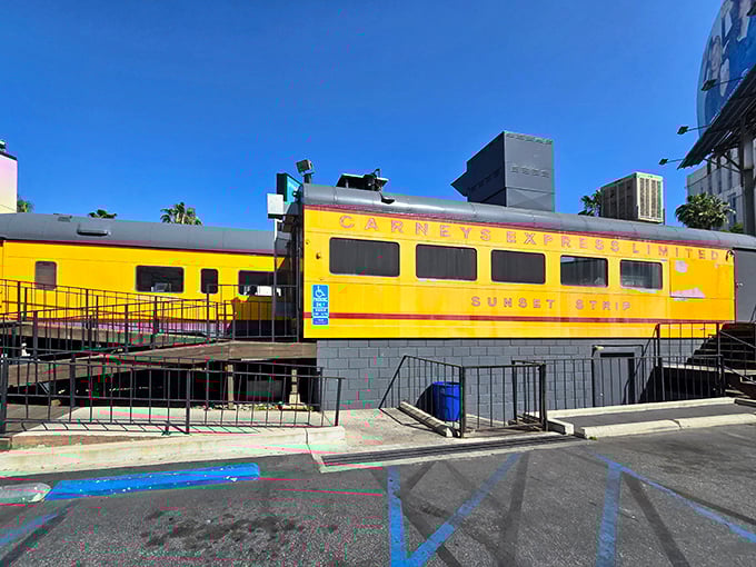 All aboard the flavor express! Carney's bright yellow train car on Sunset Strip isn't just eye-catching—it's a landmark that's been stopping traffic and satisfying cravings for decades.