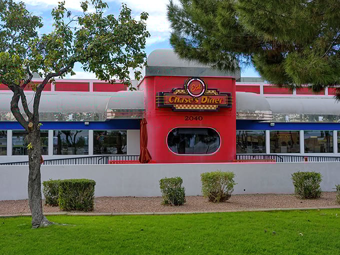 That iconic red facade isn't just eye-catching—it's a promise of the nostalgic dining experience waiting inside this Chandler landmark.
