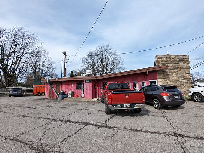 Porky's weathered parking lot tells stories of decades of hungry visitors, the cracked asphalt a testament to countless Ohio families seeking comfort food perfection.