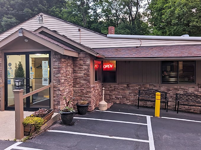 The stone facade and glowing "OPEN" sign create the perfect supper club welcome—like your favorite uncle inviting you in for the best meal of your life.