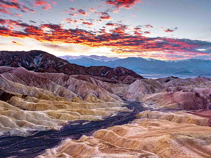 Nature's own light show transforms Death Valley's rugged terrain into a painter's dream at sunset. Even the rocks seem to blush.