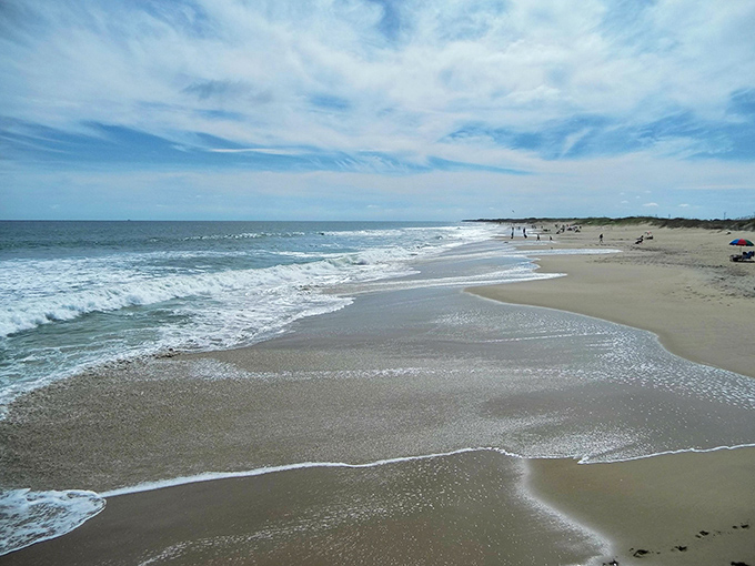 Pristine sands meet gentle Atlantic waves at Little Island Park, where the horizon stretches endlessly and crowds are refreshingly absent.