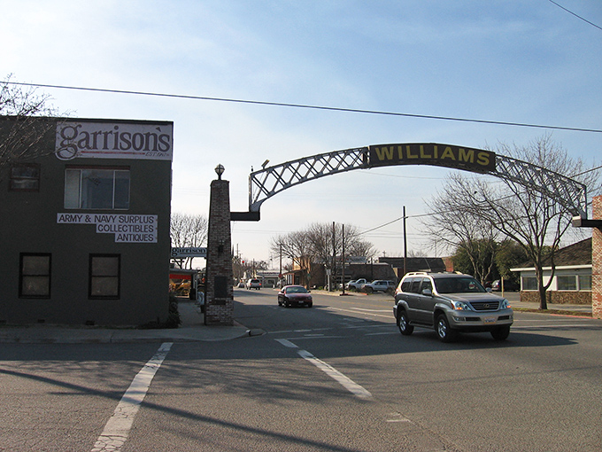 Downtown Williams showcases its historic charm with weathered brick facades and green-trimmed windows—architectural storytelling that whispers tales of California's agricultural past.