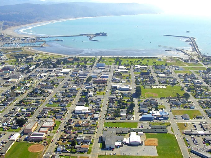 Crescent City lives up to its name with this stunning curved shoreline. From above, the grid-pattern streets reveal a town that embraces both order and oceanic wildness.