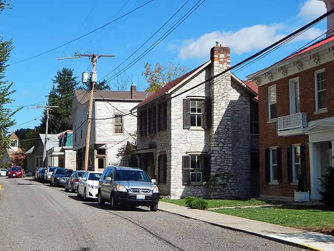 Main Street magic! Elsah's historic limestone buildings and colorful clapboard homes create a scene that feels plucked straight from a Norman Rockwell painting.
