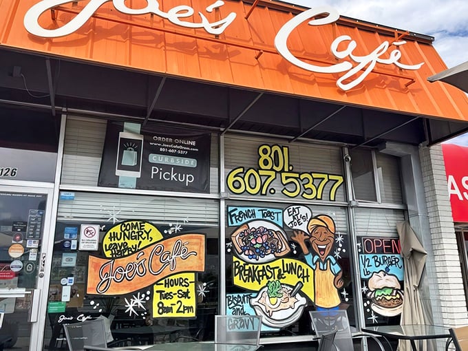 Window art that speaks the universal language of hunger: "Come hungry, leave happy" isn't just a slogan—it's a Joe's Cafe promise.