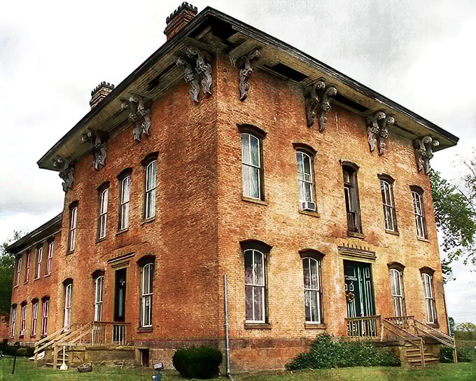 This towering brick fortress commands attention like a Victorian-era celebrity – impossible to ignore and absolutely unforgettable.