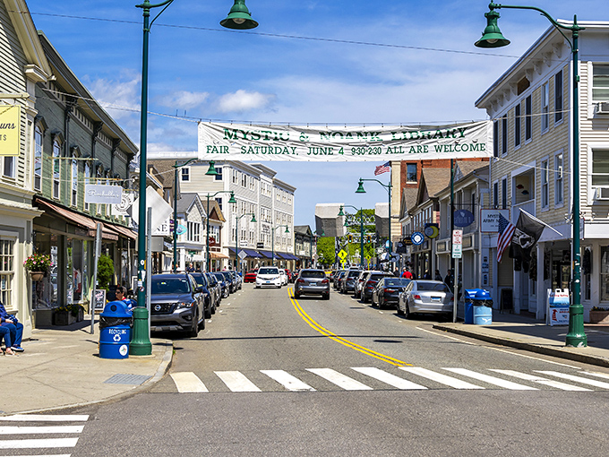 Downtown Mystic welcomes visitors with a classic New England main street vibe, where even the street banners invite you to join the local festivities.