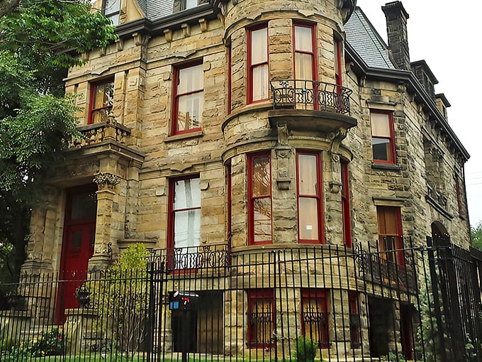 The full façade reveals the castle's impressive turrets and balconies – Victorian-era "curb appeal" that still stops traffic in Cleveland's Ohio City neighborhood.