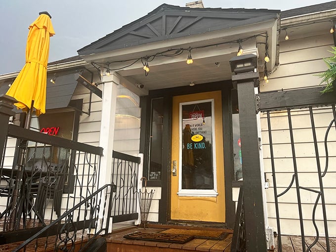 That cheerful yellow door isn't just an entrance to a restaurant—it's a portal to Italy that conveniently doesn't require passport renewal or TSA pat-downs.
