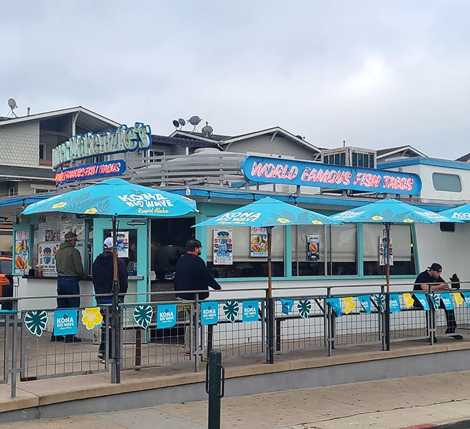 The turquoise-trimmed beacon of seafood salvation beckons hungry travelers with its bold promise of "World Famous Fish Tacos" – a claim you'll soon agree is no exaggeration.