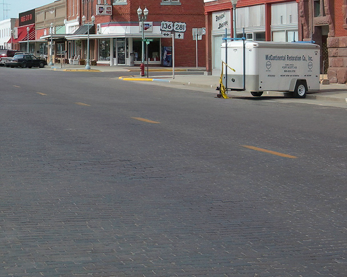 Brick streets that whisper history beneath your tires. Red Cloud's main thoroughfare feels like driving through a time portal where modern life slows to a gentler pace.