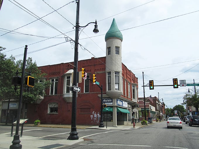 That iconic turret on the corner building isn't compensating for anything—it's just Titusville showing off its architectural flair with Victorian confidence.