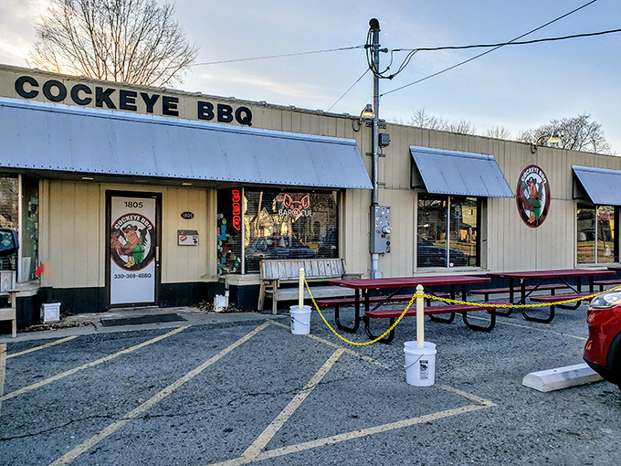 The unassuming exterior of Cockeye BBQ proves once again that the best food often hides behind the simplest facades. Smoke signals of deliciousness await inside.