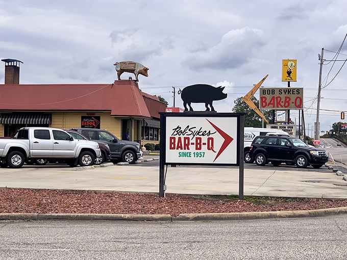 The silhouette of that pig on the sign isn't just decoration—it's a promise of what awaits inside. BBQ paradise since 1957.