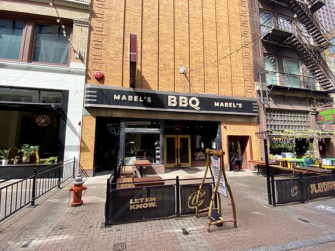 The unassuming brick façade of Mabel's BBQ belies the flavor explosion waiting inside. Cleveland's culinary gem stands ready on East 4th Street.