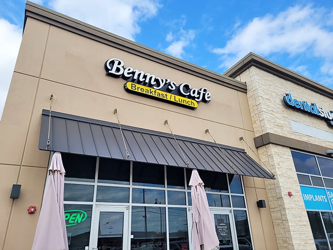 Benny's Cafe stands proudly against the Texas sky, its simple exterior hiding breakfast treasures that would make a waffle connoisseur weep with joy.
